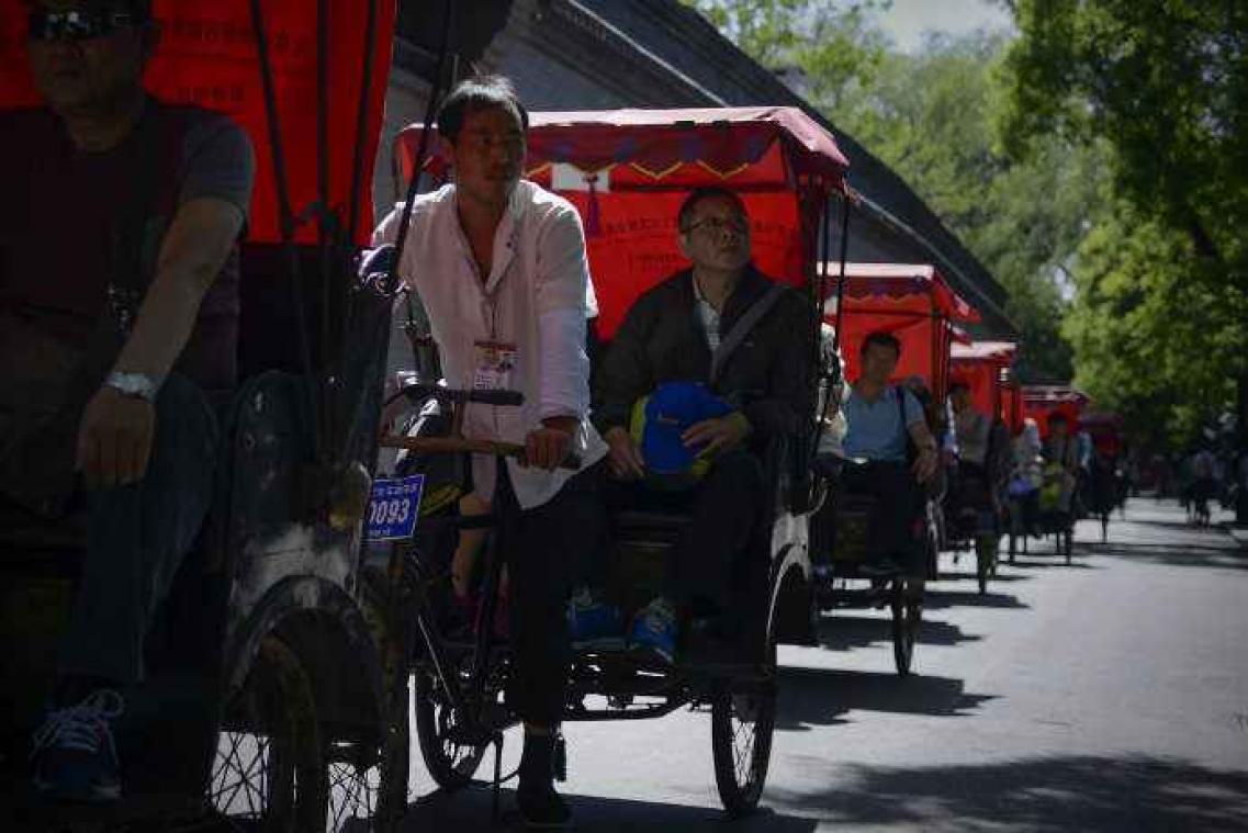 A Pékin, le "pousse-pousse" joue sa survie - Metrotime